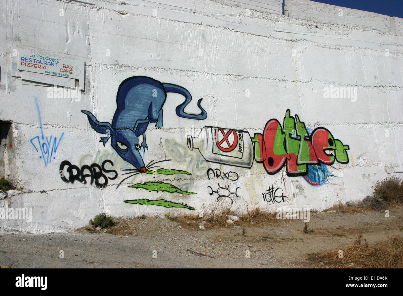Graffiti on wall close to beach Stock Photo - Alamy