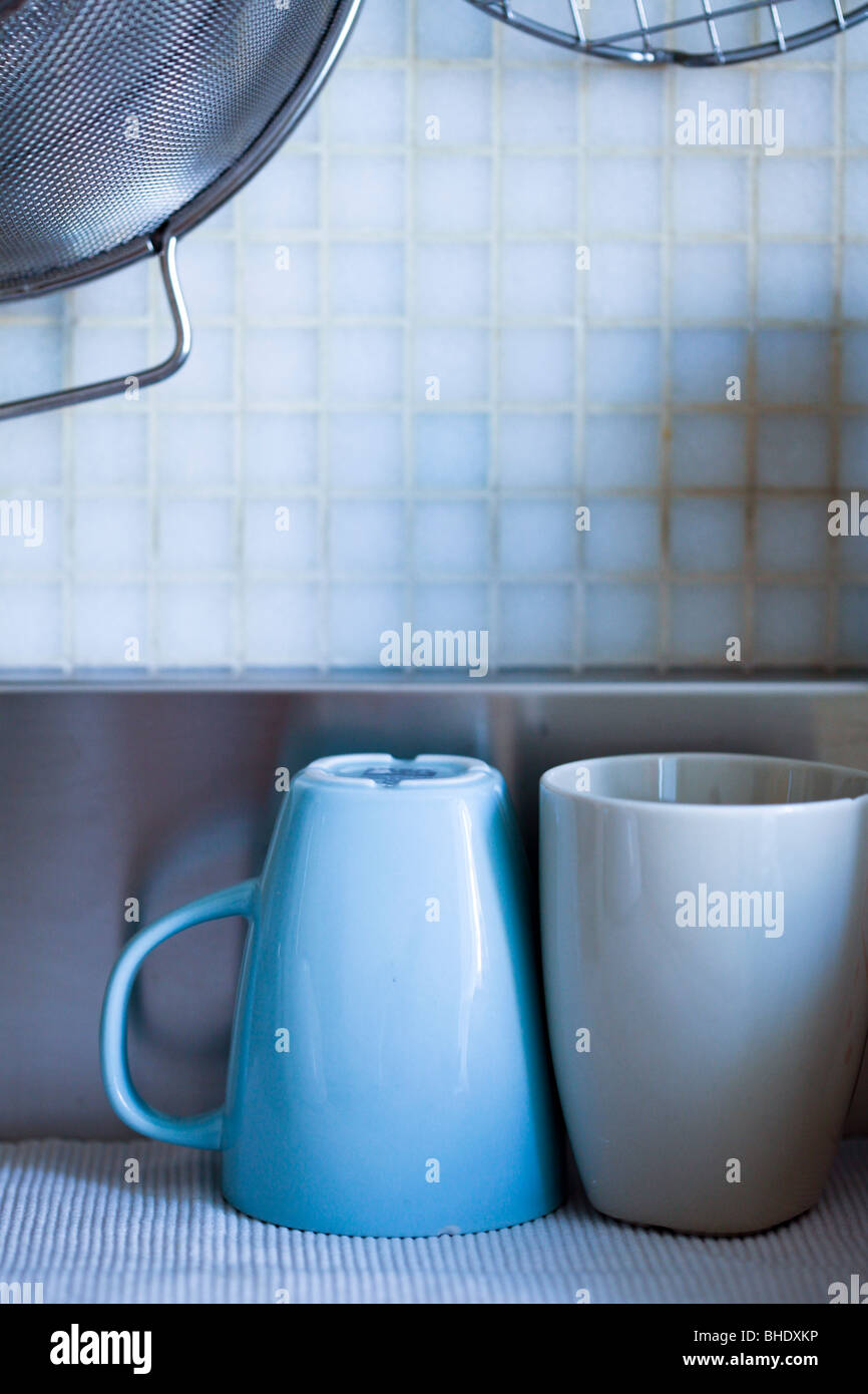 mugs in the kitchen Stock Photo - Alamy