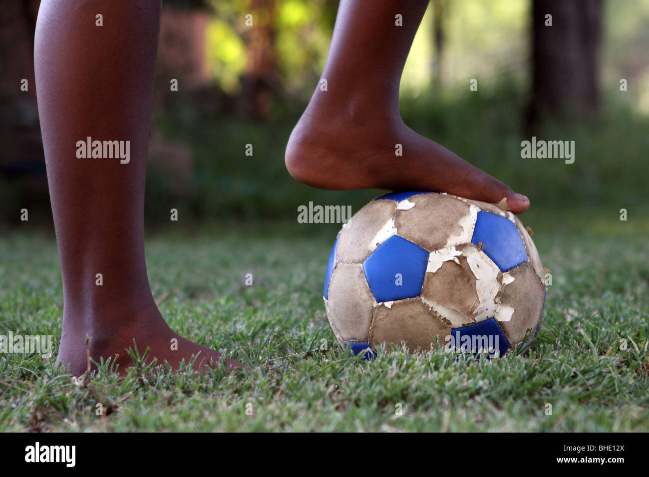 Feet on soccer ball hi-res stock photography and images - Alamy