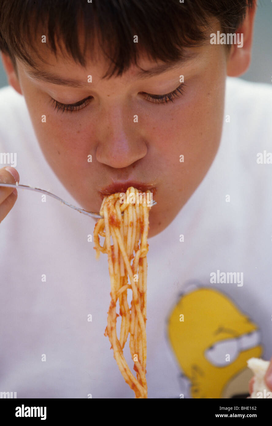 Portrait little boy eating spaghetti hi-res stock photography and ...