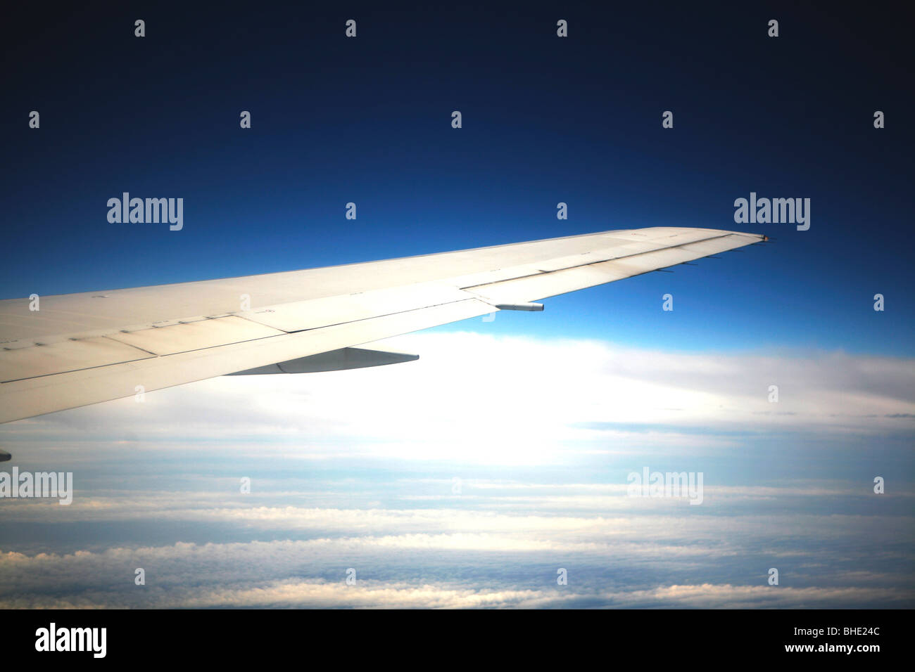wing of passenger jet in flight Stock Photo - Alamy