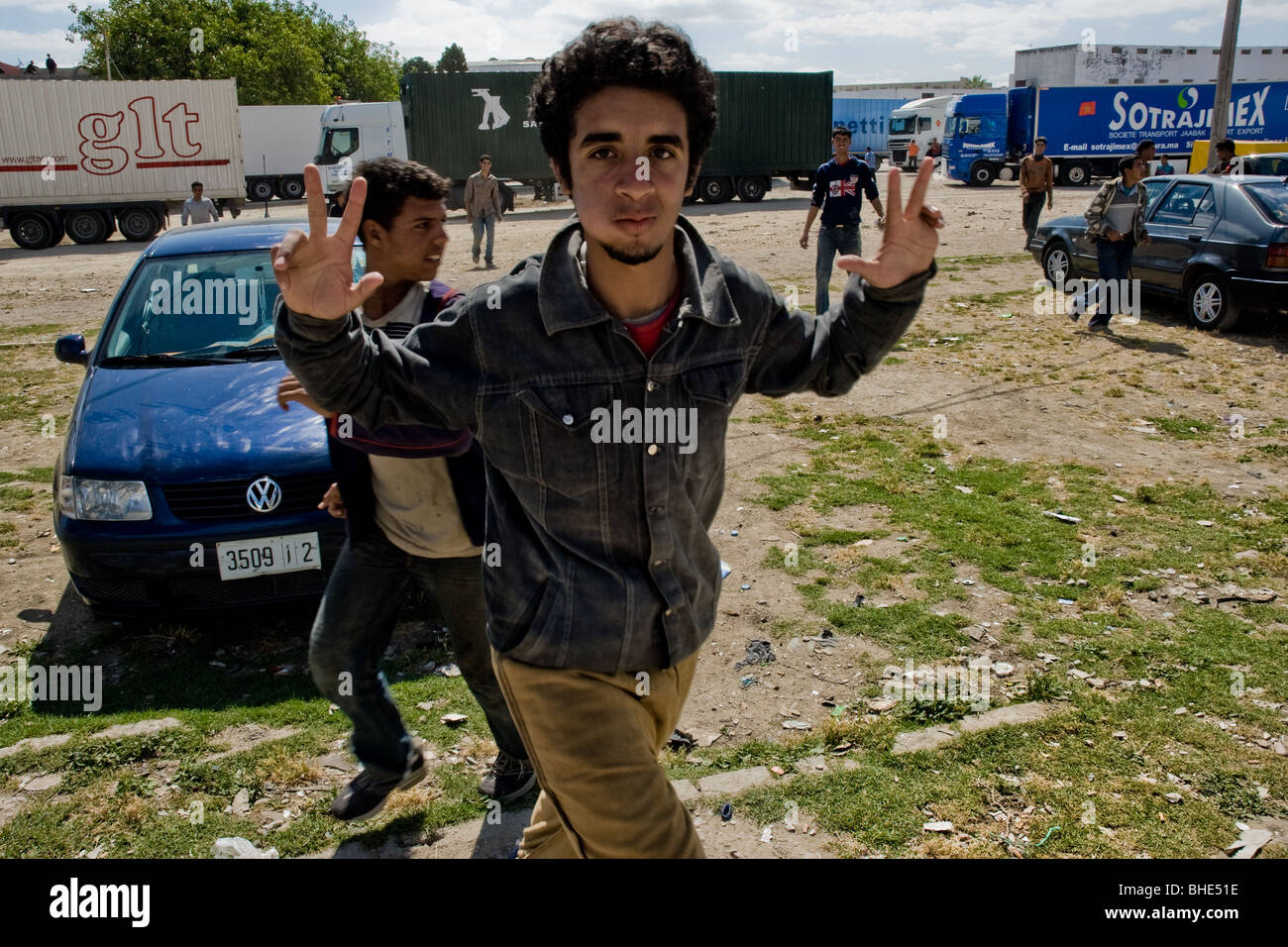 Moroccan fugitives running to escape the Moroccan police on the parking ...