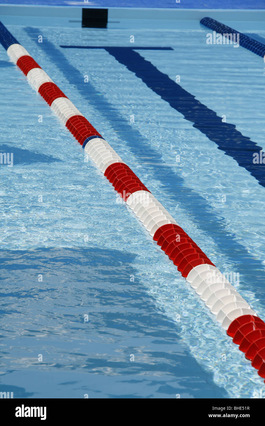 empty olympic type swimming pool with lanes Stock Photo - Alamy