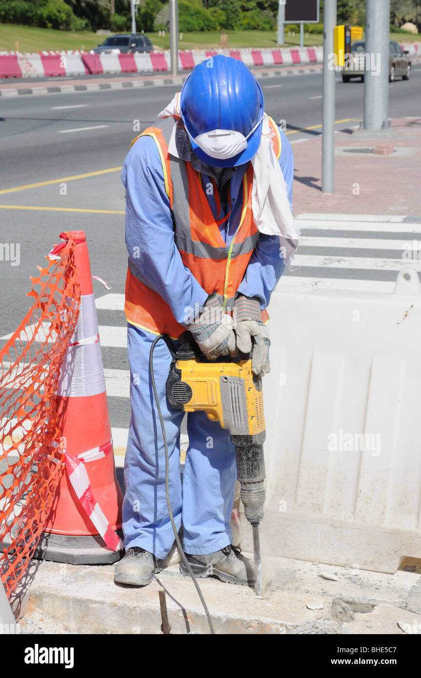 Street Worker in Dubai, United Arab Emirates Stock Photo - Alamy