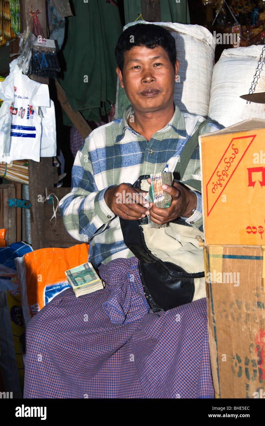 Merchant counting his money, Vegetable market, Mandalay, Burma, Myanmar ...