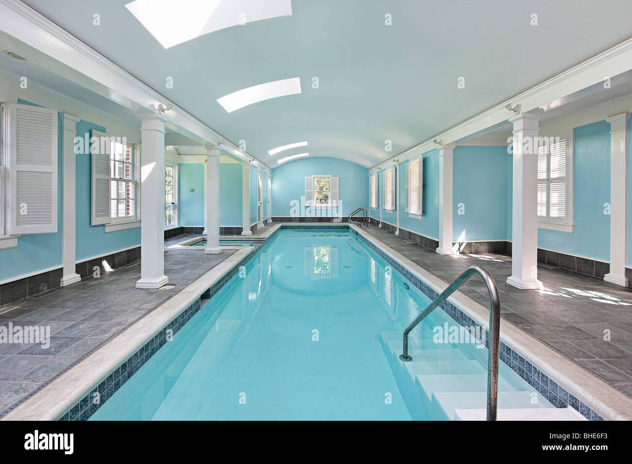 Long indoor swimming pool in luxury home Stock Photo - Alamy