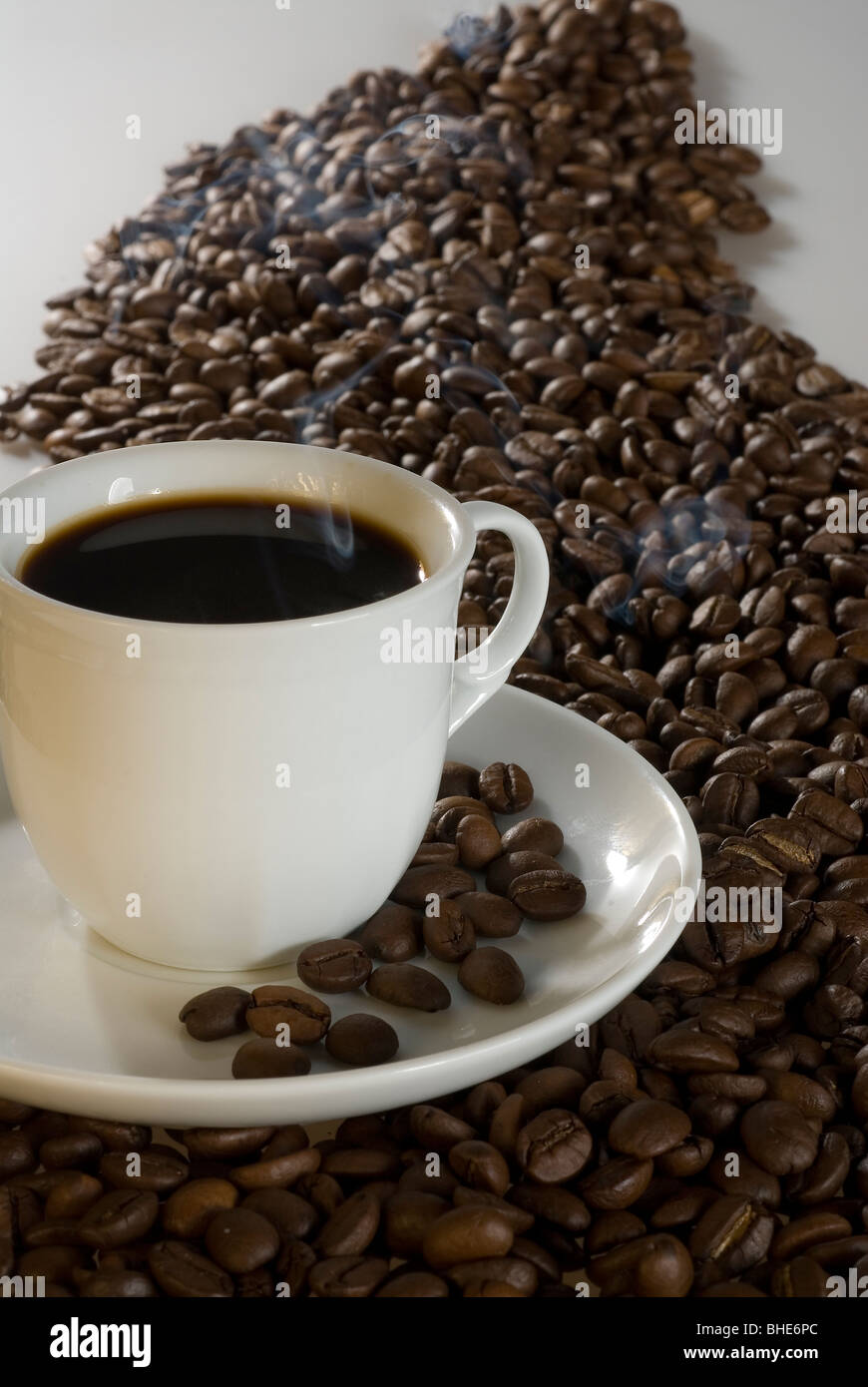 A cup of hot black coffee with smoke Stock Photo - Alamy