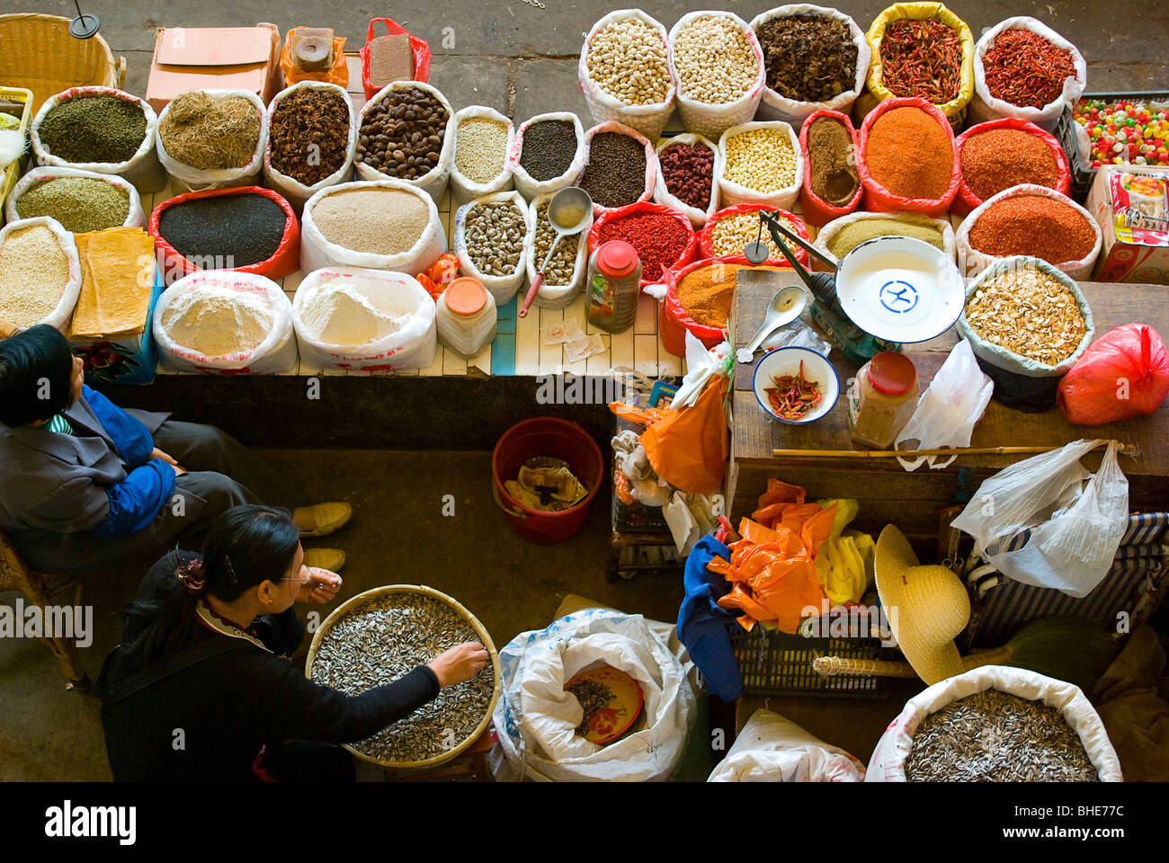 Asia, China, Yunnan Province, Mojiang. Spices for sale at indoor market ...