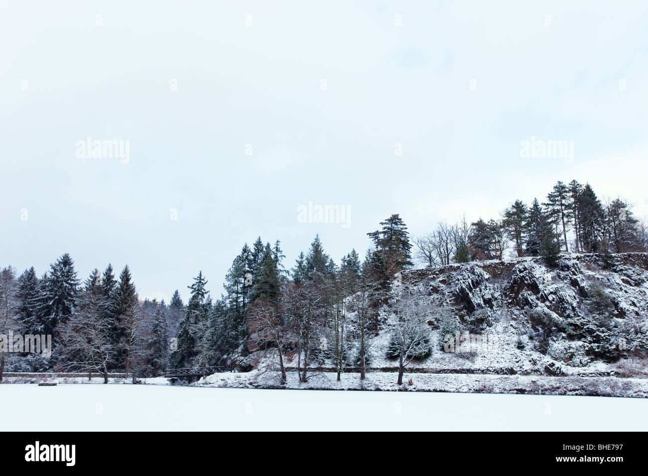 Frozen lake and rock formation Stock Photo - Alamy