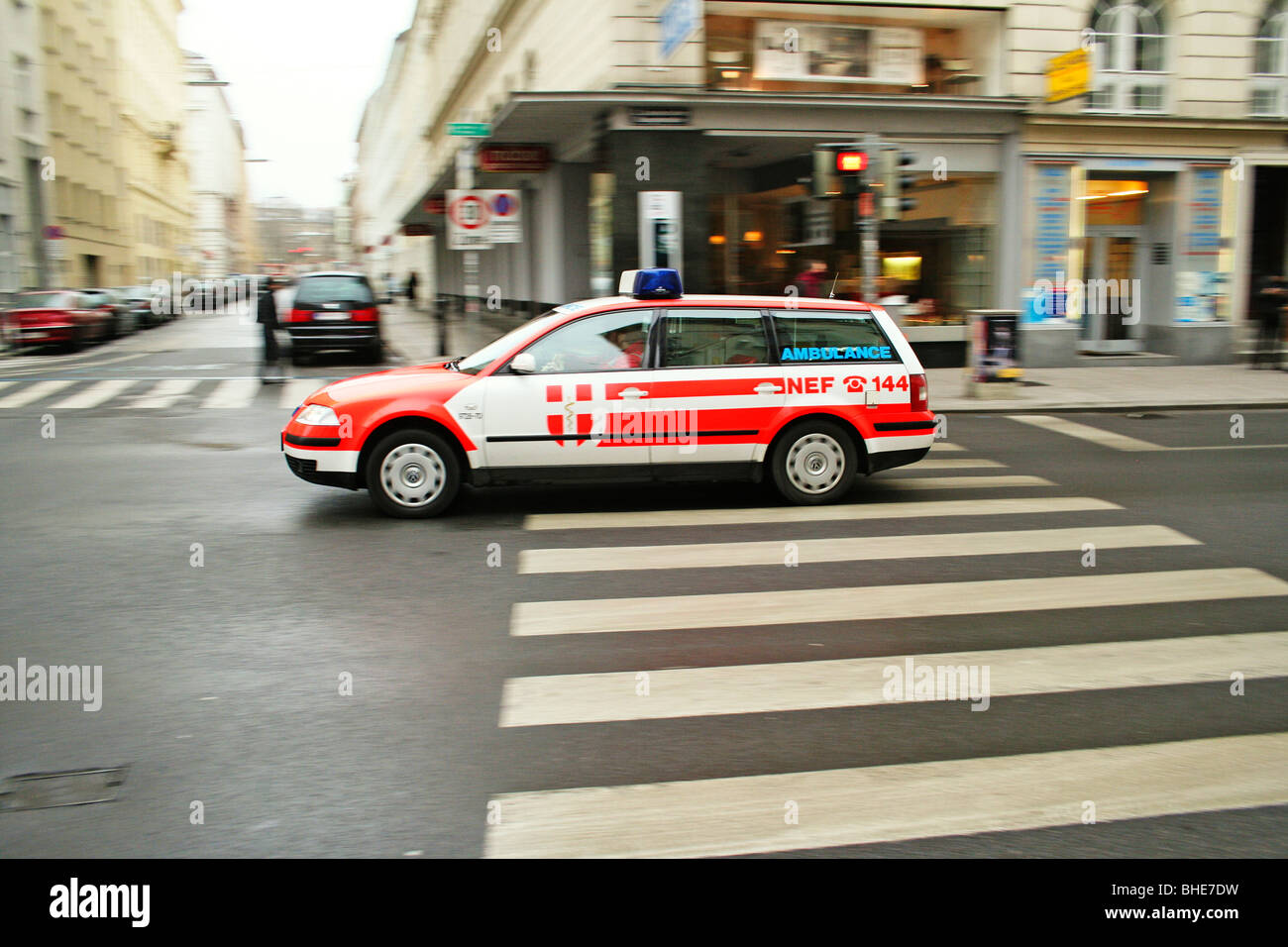 blurred side profile of an ambulance rushing on a city street Stock ...