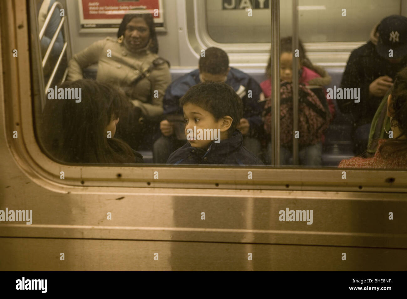 Child rides the F Train, in Brooklyn, New York Stock Photo - Alamy