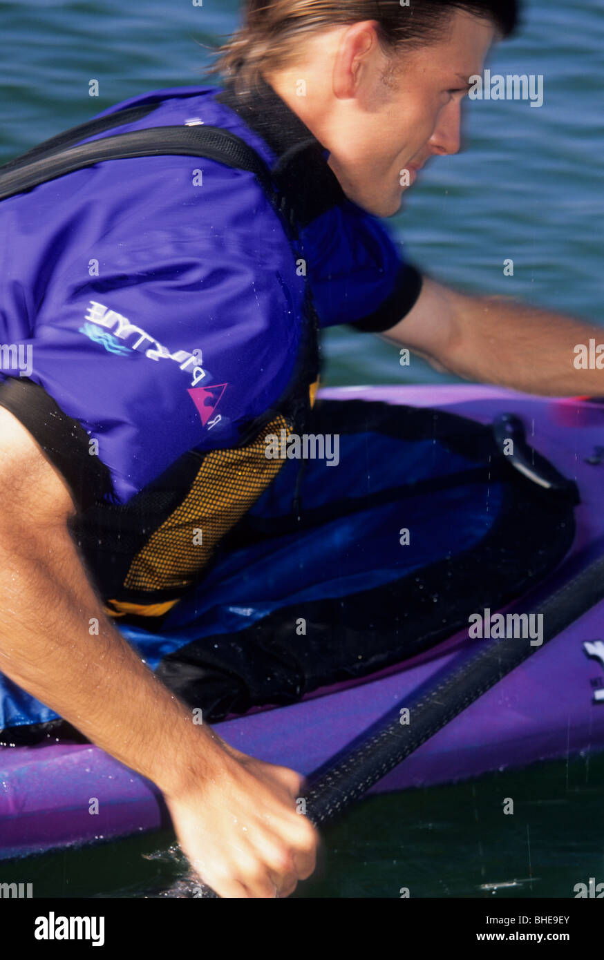 Man sea kayaking Stock Photo - Alamy