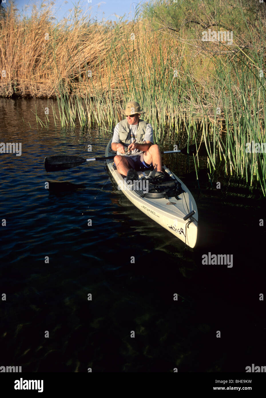 Person kayaking on river Stock Photo - Alamy