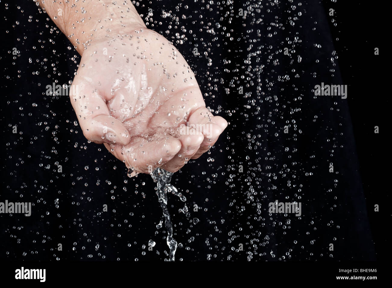 Water in palms of hands Stock Photo - Alamy