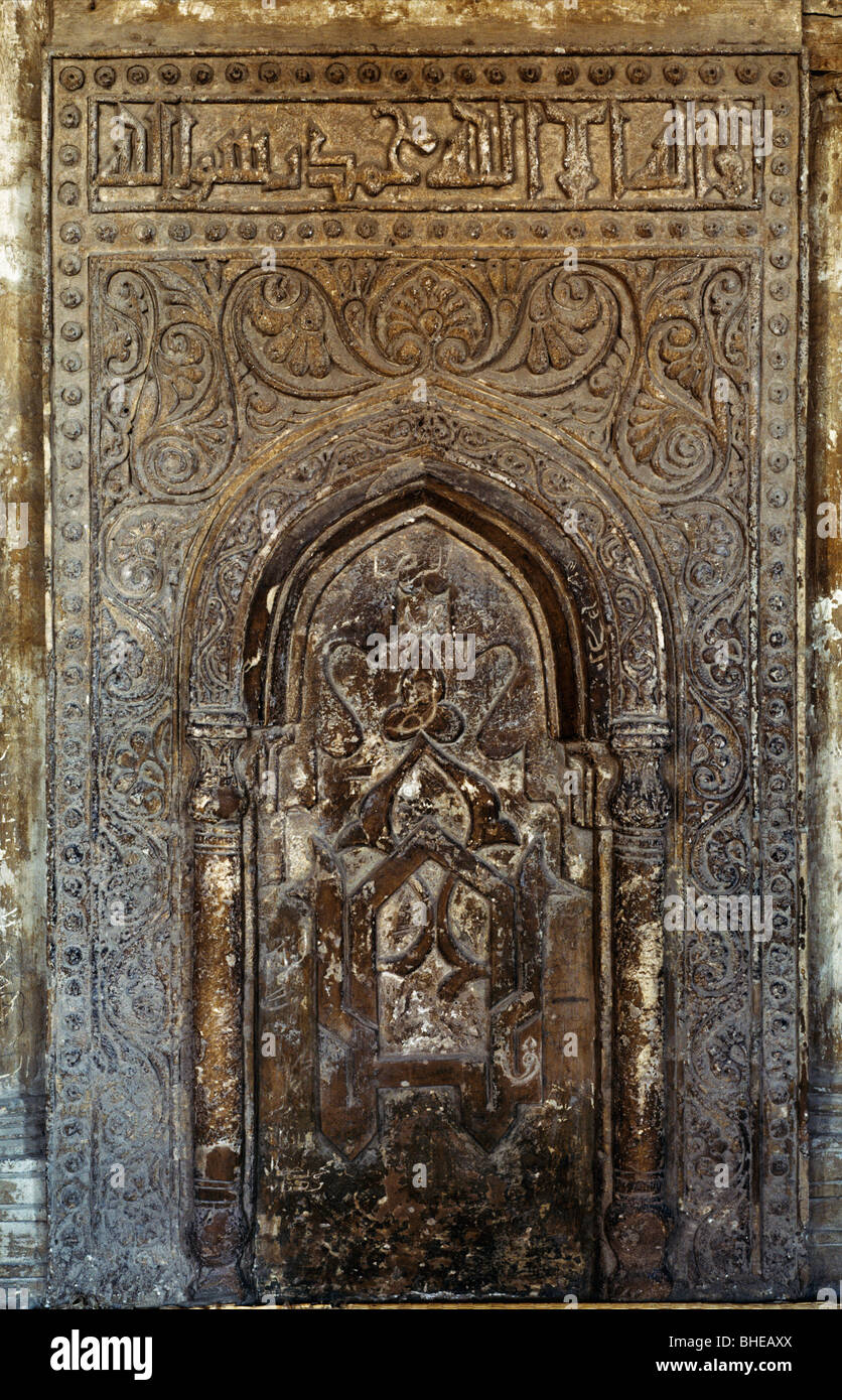 Mosque of Ibn Tuluun, Cairo, founded 879 AD. Flat mihrab of carved ...