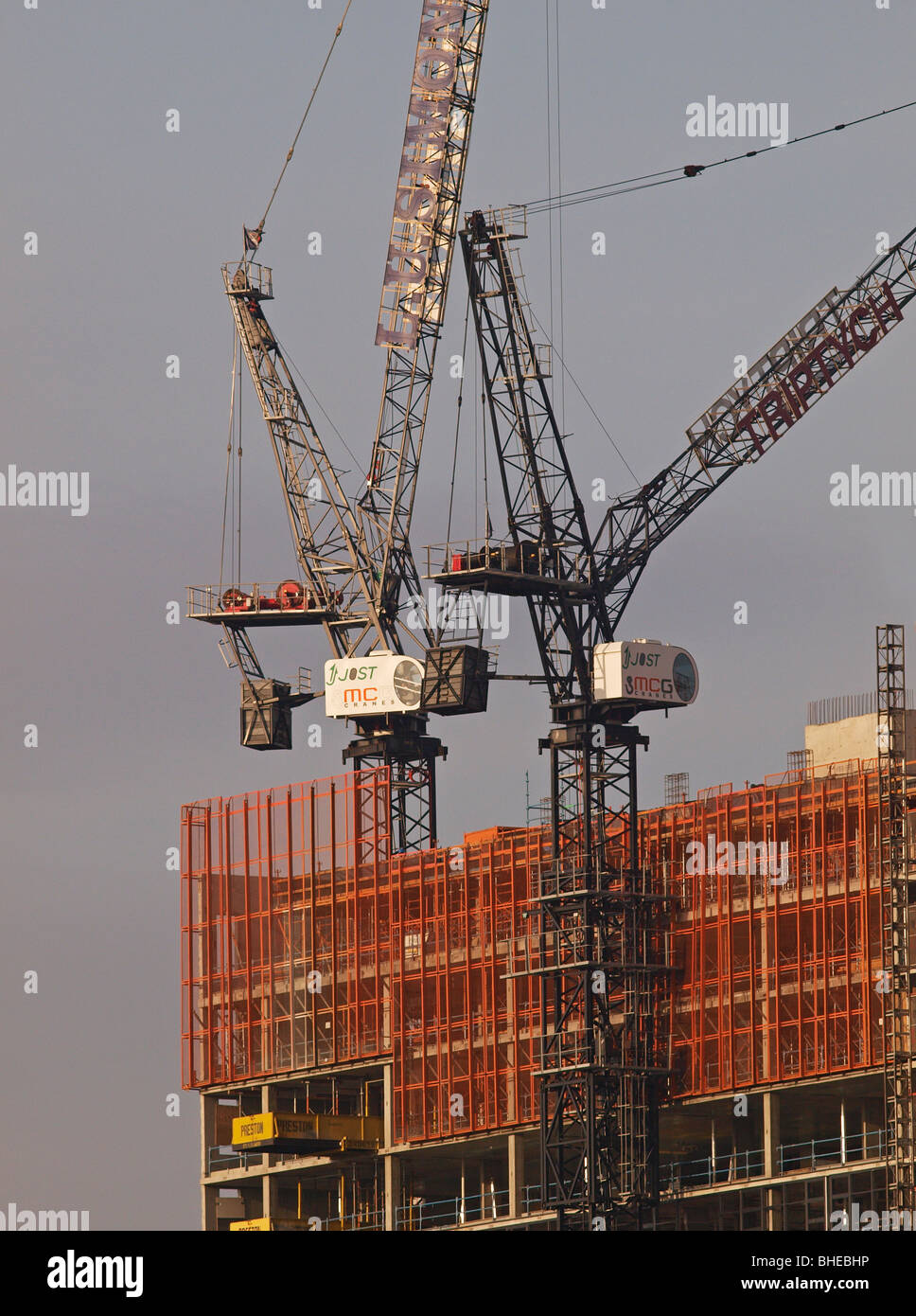 BUILDING UNDER CONSTRUCTION WITH TOWER CRANES MELBOURNE VICTORIA ...