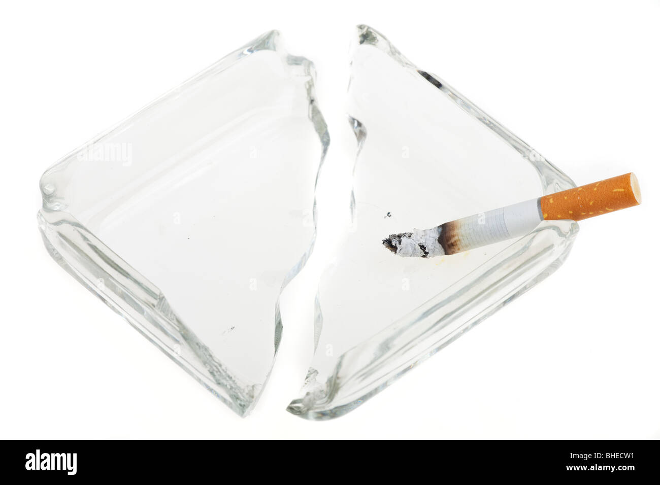 cigarette on a broken ashtray isolated on white Stock Photo - Alamy