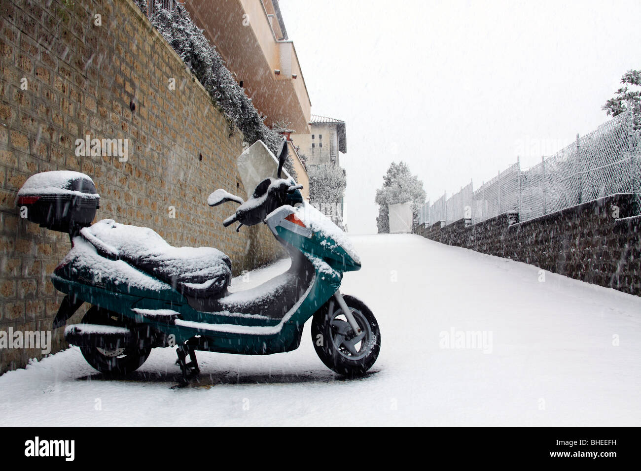 Motorbike Covered In Snow Stock Photos & Motorbike Covered In Snow ...