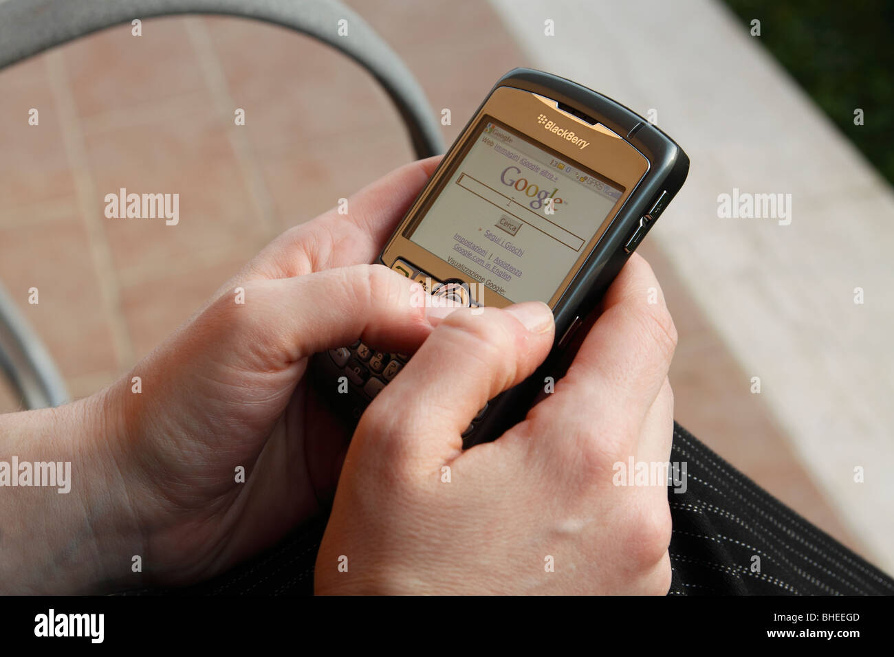 A woman using a smartphone Stock Photo - Alamy
