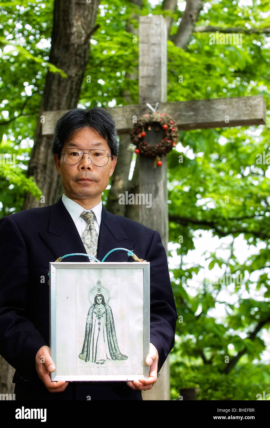 Norihide Nagano, tourism official and curator of the museum and site of ...