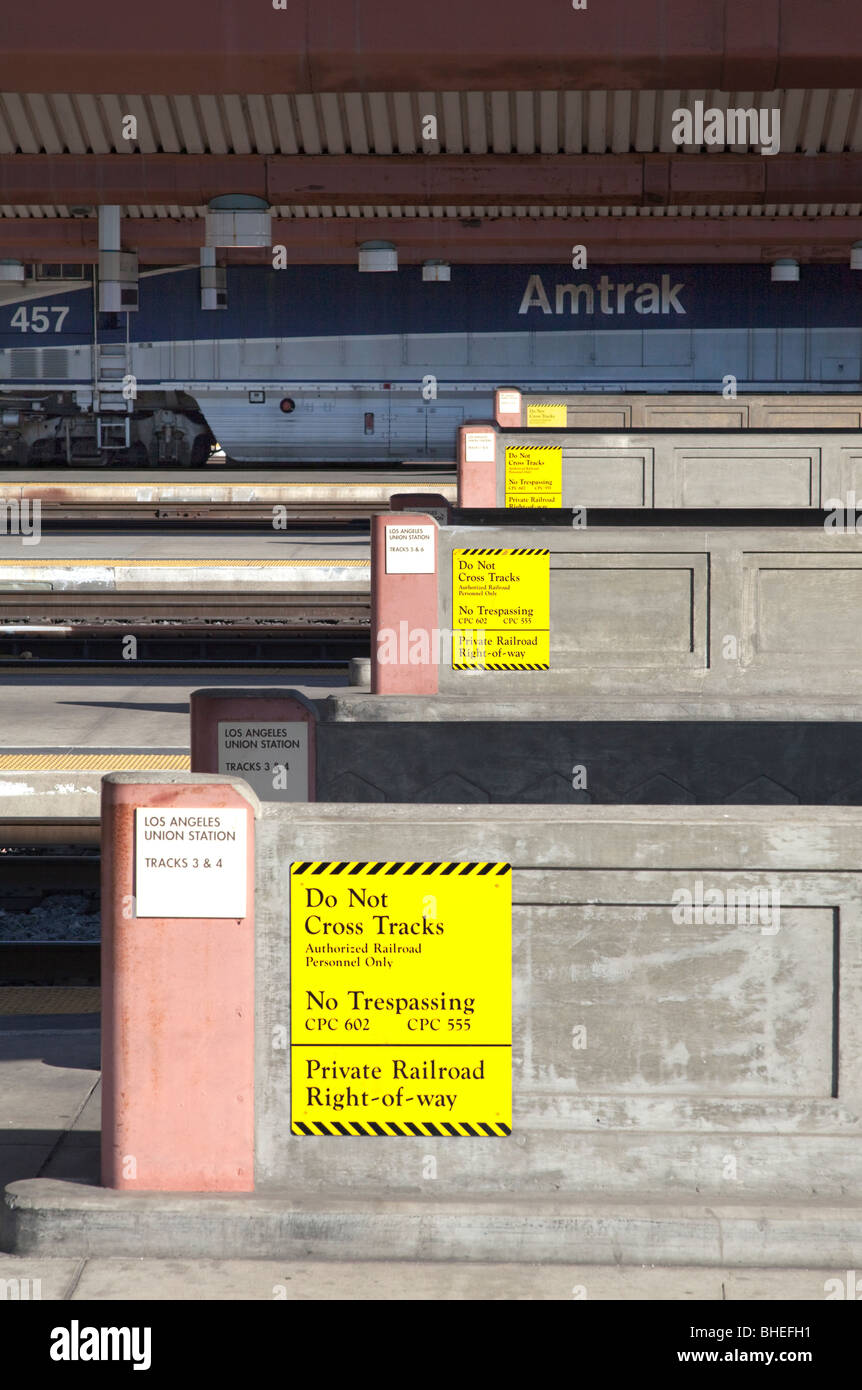 Warning signs and tracks at Union Station, Los Angeles, CA Stock Photo ...
