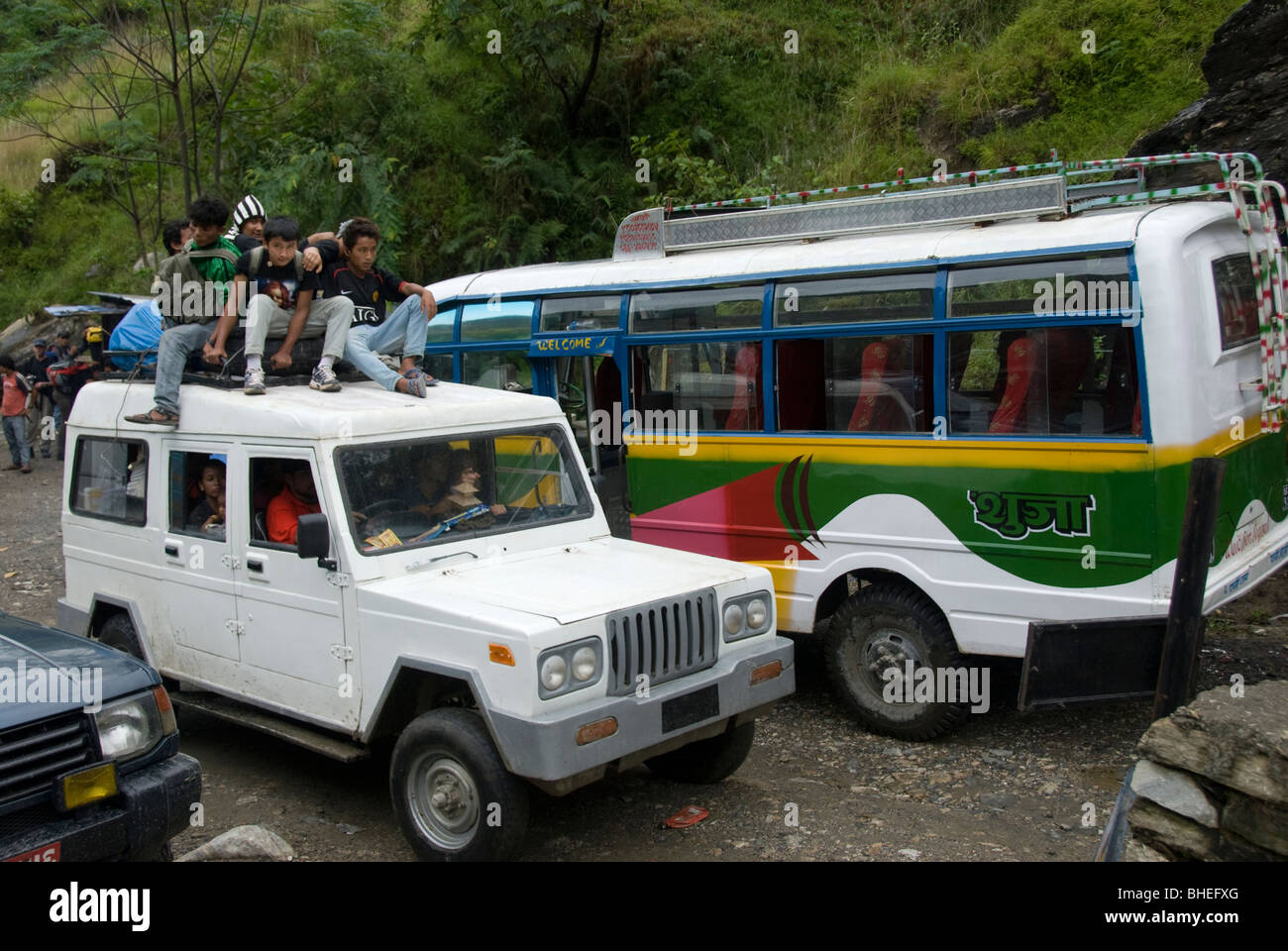 Passengers on roof of jeep at bus terminal at Bhulbhule village Lamjung ...