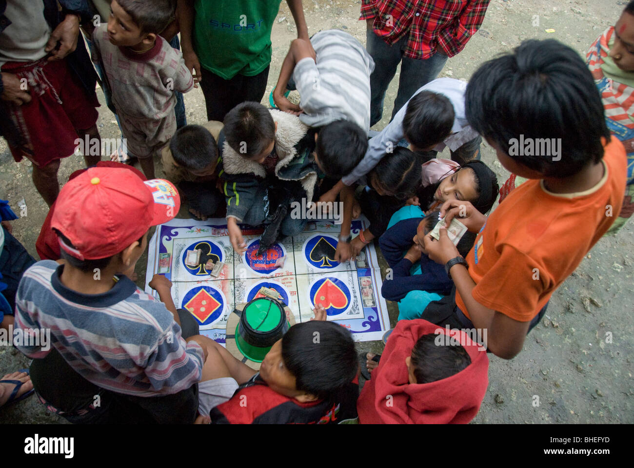 Children playing gambling game, Bahundanda Village, Lamjung District ...