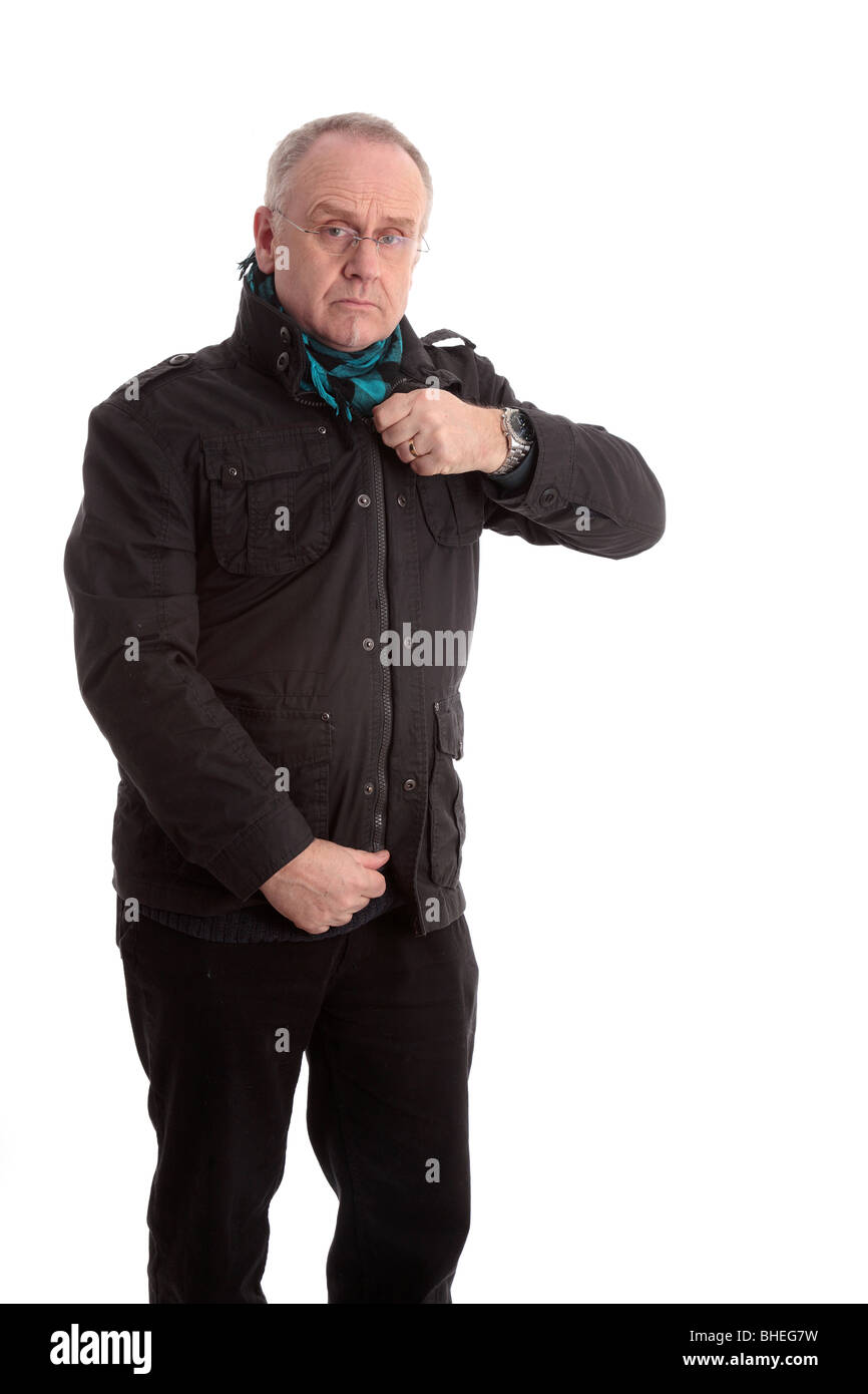 Mature man fastening his jacket Stock Photo - Alamy