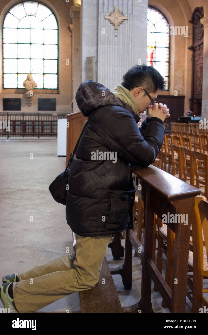 Kneeling In Church Stock Photos & Kneeling In Church Stock Images - Alamy