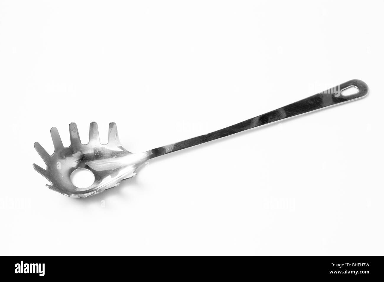 Large stainless steel spaghetti server, Kitchen Utensil isolated ...
