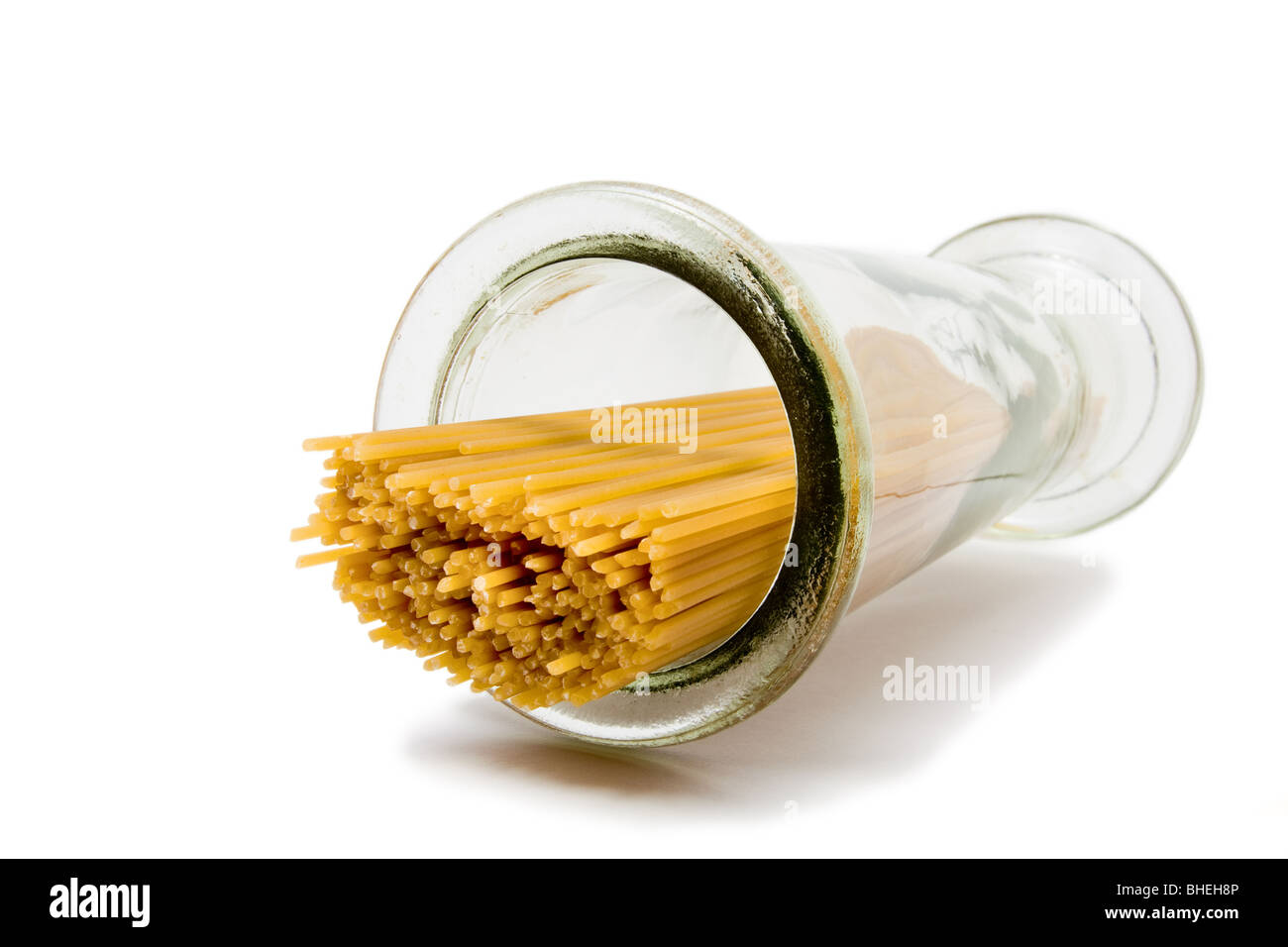 Dried spaghetti isolated against white background Stock Photo - Alamy