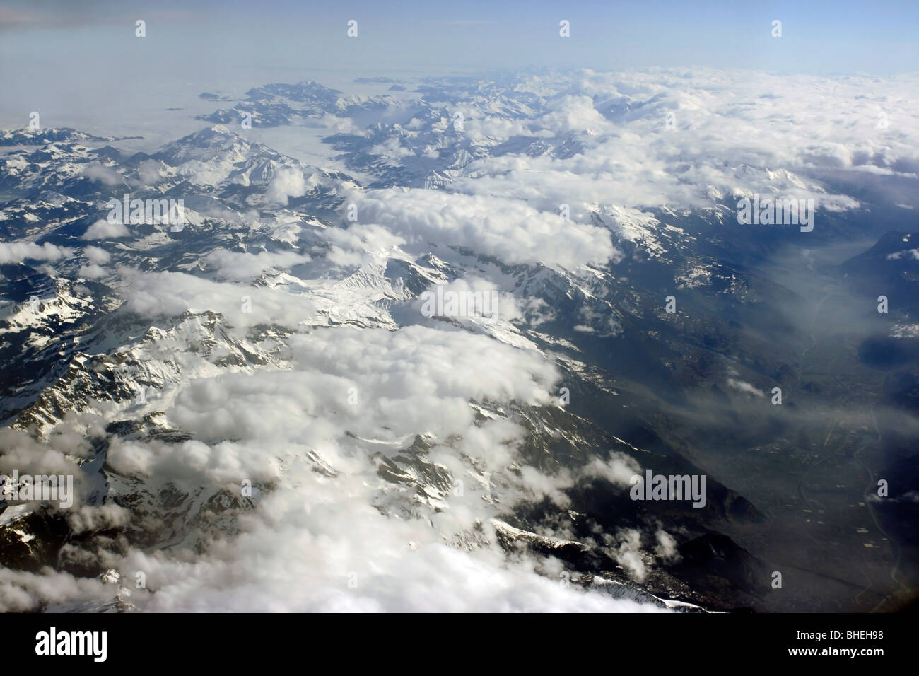Aerial view of the Alps at 40,000 feet from an airplane Stock Photo - Alamy