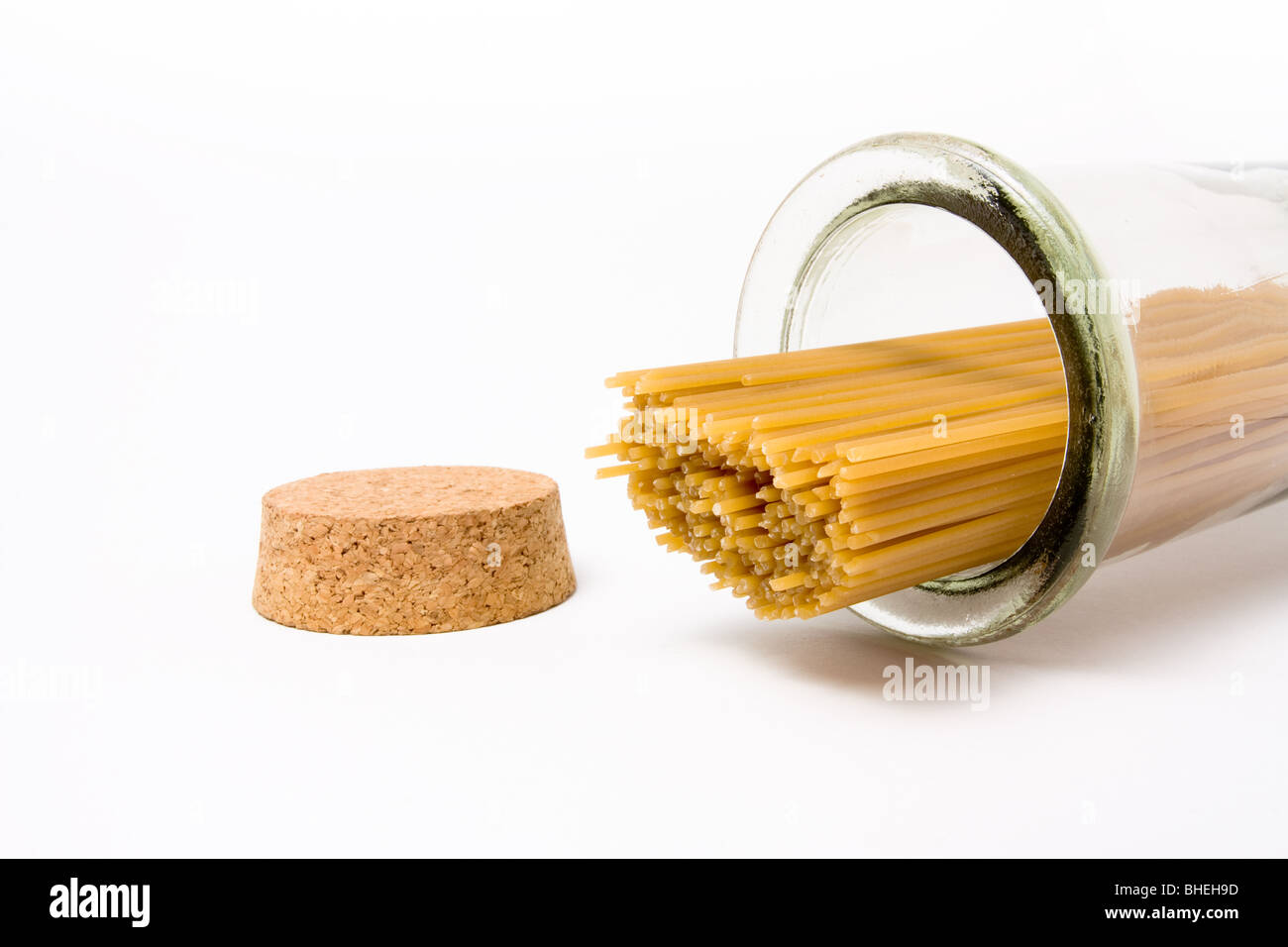 Dried spaghetti isolated against white background Stock Photo - Alamy