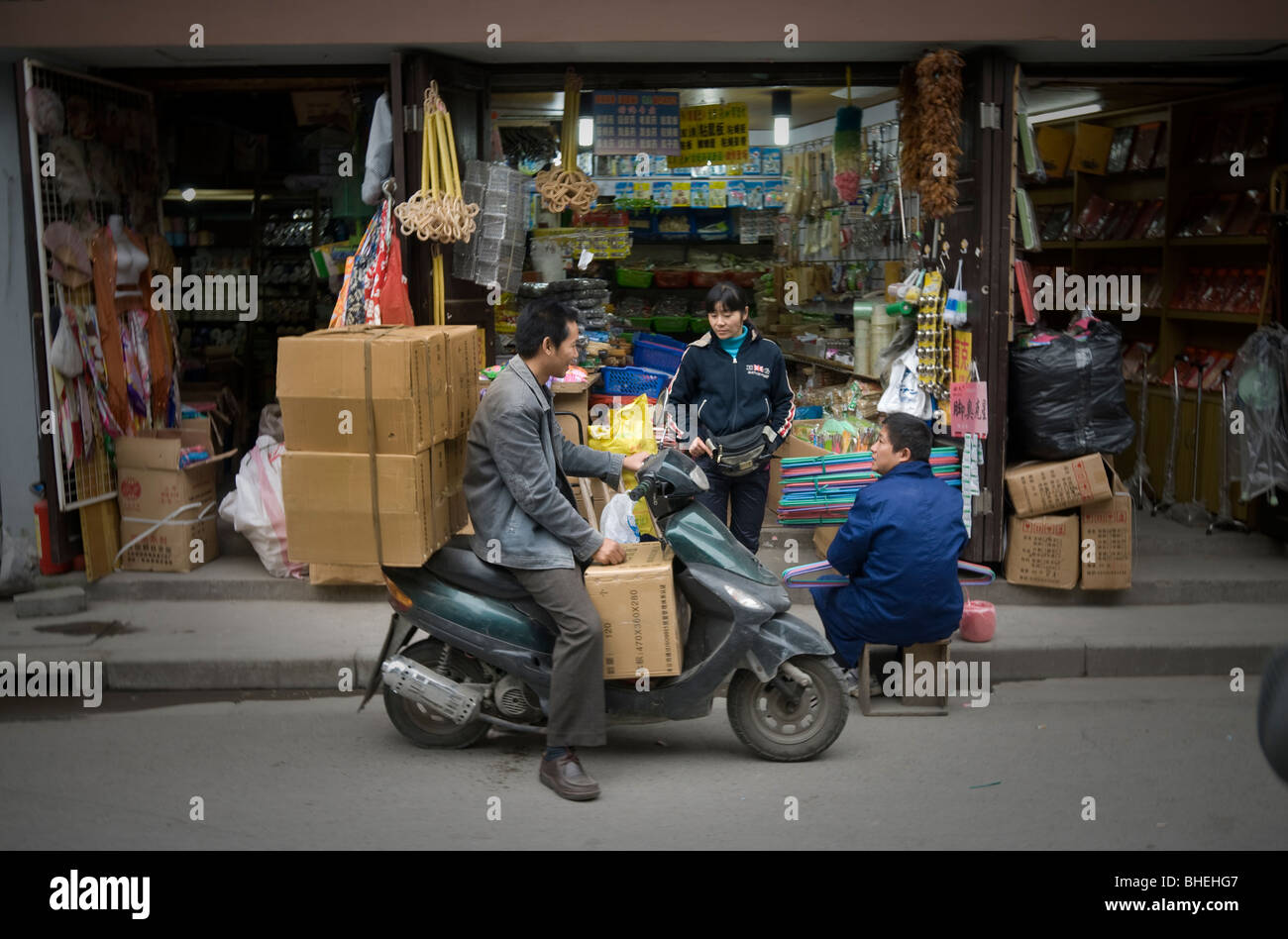 Delivery man in china hi-res stock photography and images - Alamy