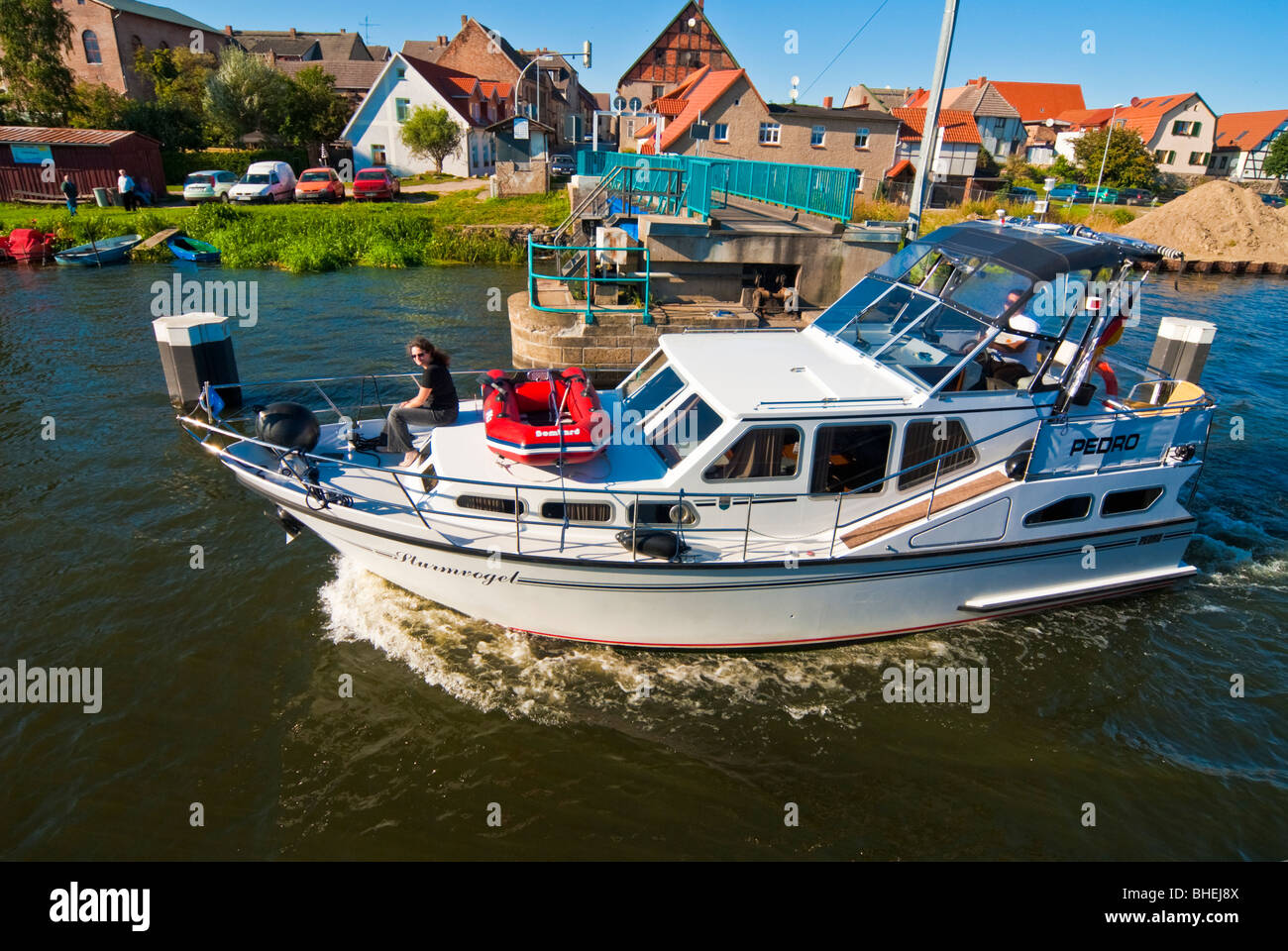 Charter yacht passing oldest hand operated turning bridge in Europe ...