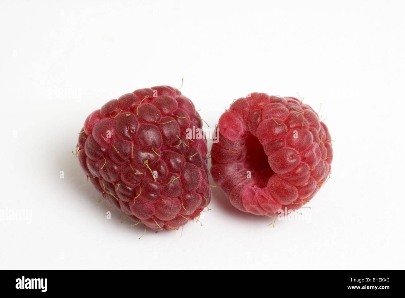 Two red raspberries Stock Photo - Alamy