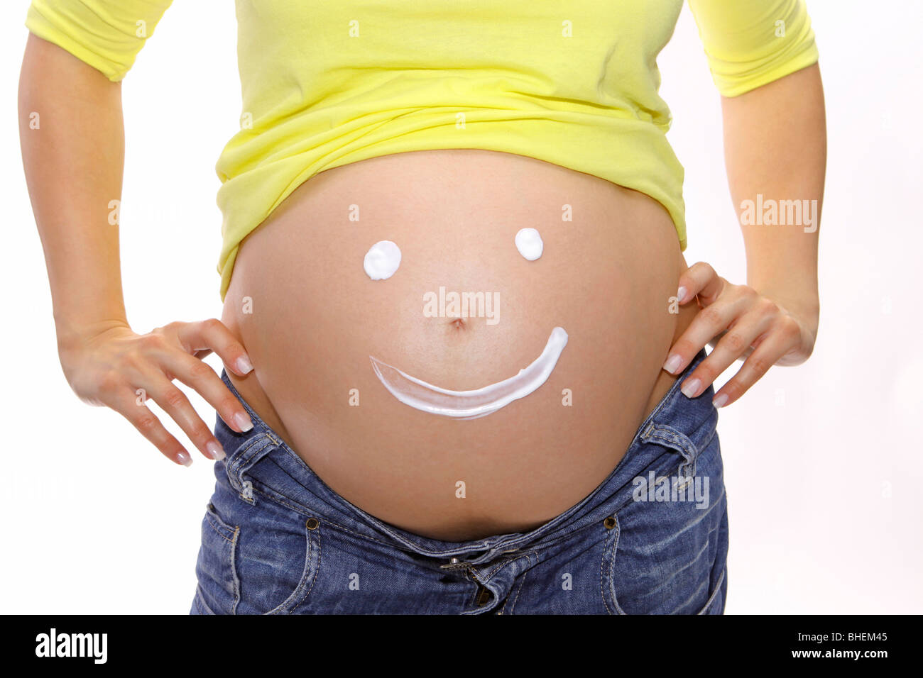 Woman Belly Smiley High Resolution Stock Photography and Images - Alamy
