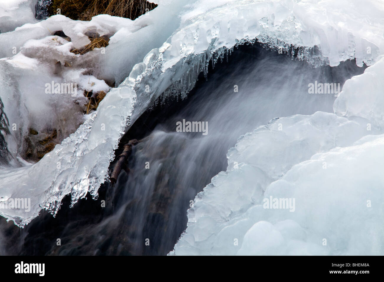 A small waterfall in the winter Stock Photo - Alamy