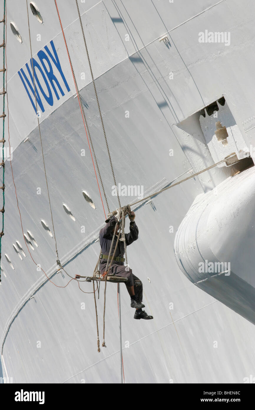 Painting the anchor Stock Photo - Alamy