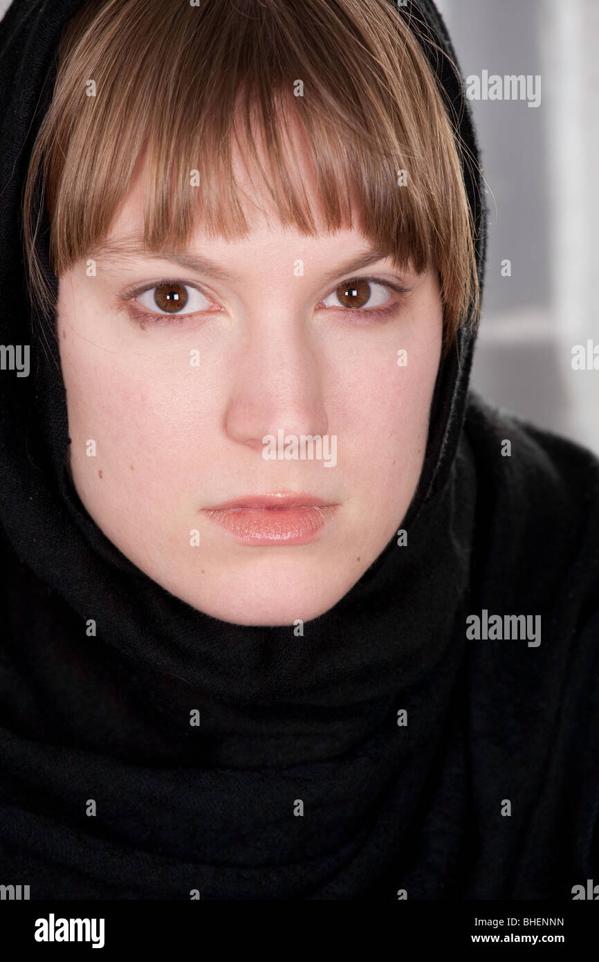Woman face looking to camera fierce hi-res stock photography and images ...