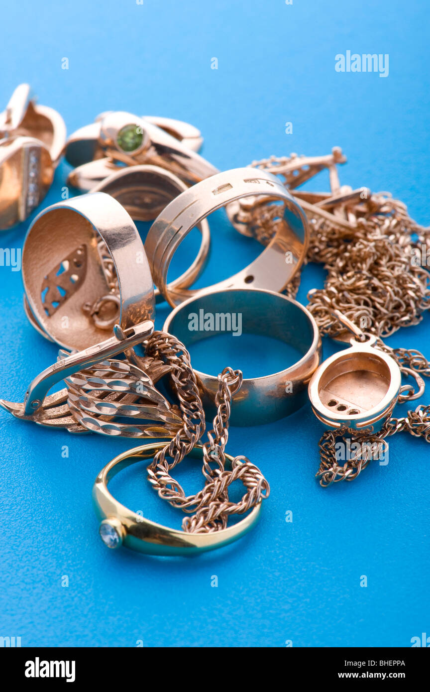 object on blue - Gold rings close up Stock Photo - Alamy