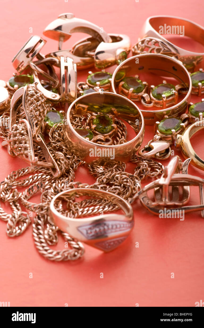 object on red - Gold jewel close up Stock Photo - Alamy