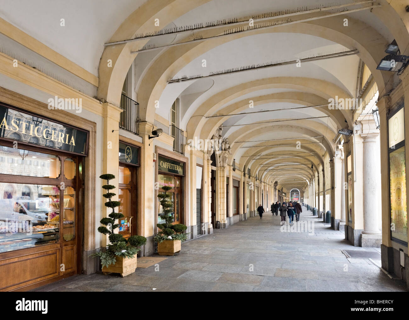 Cafe and shops in a portico on the Piazza San Carlo in the historic ...