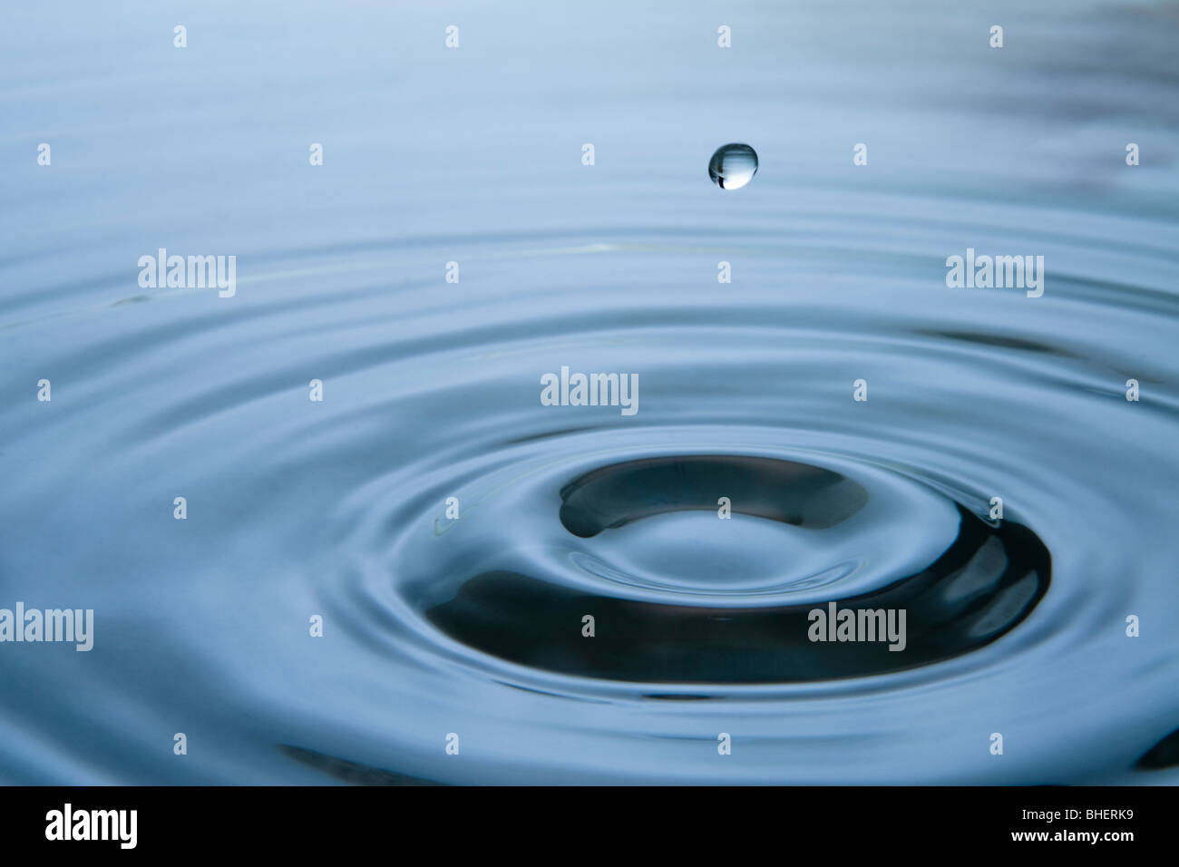 Falling drop of water Stock Photo - Alamy