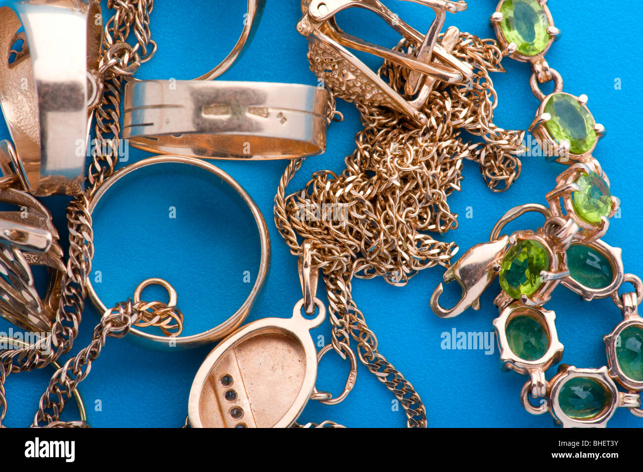 object on blue - Gold rings close up Stock Photo - Alamy