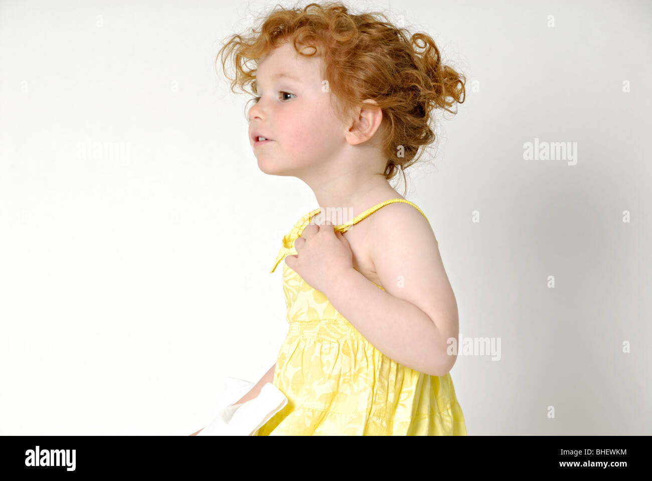 Red haired little girl Stock Photo - Alamy