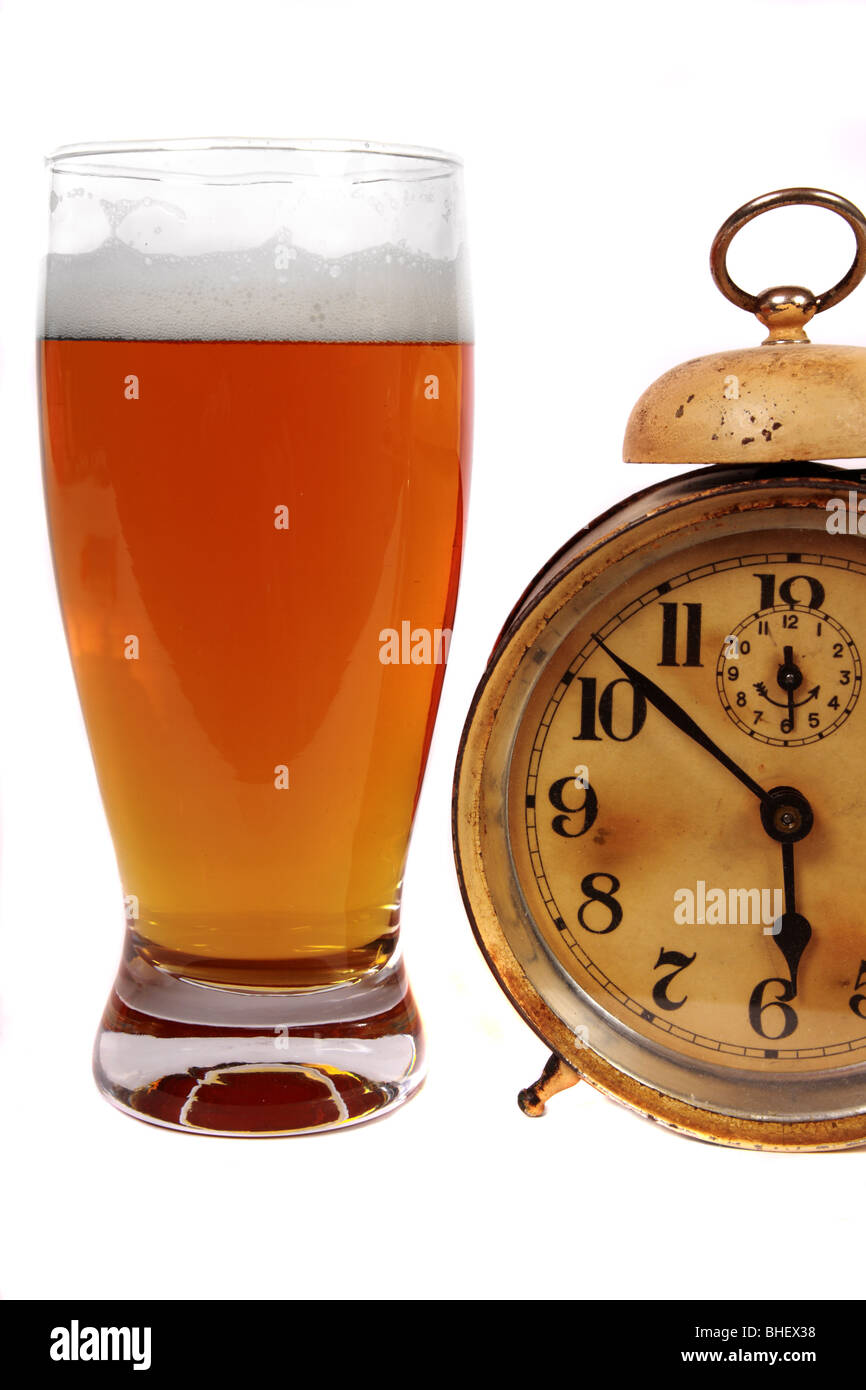 Beer and alarm clock, time to take a break Stock Photo - Alamy