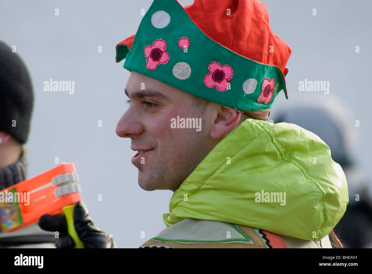 Russian young man in national Russian suit. Celebration of pancake week ...