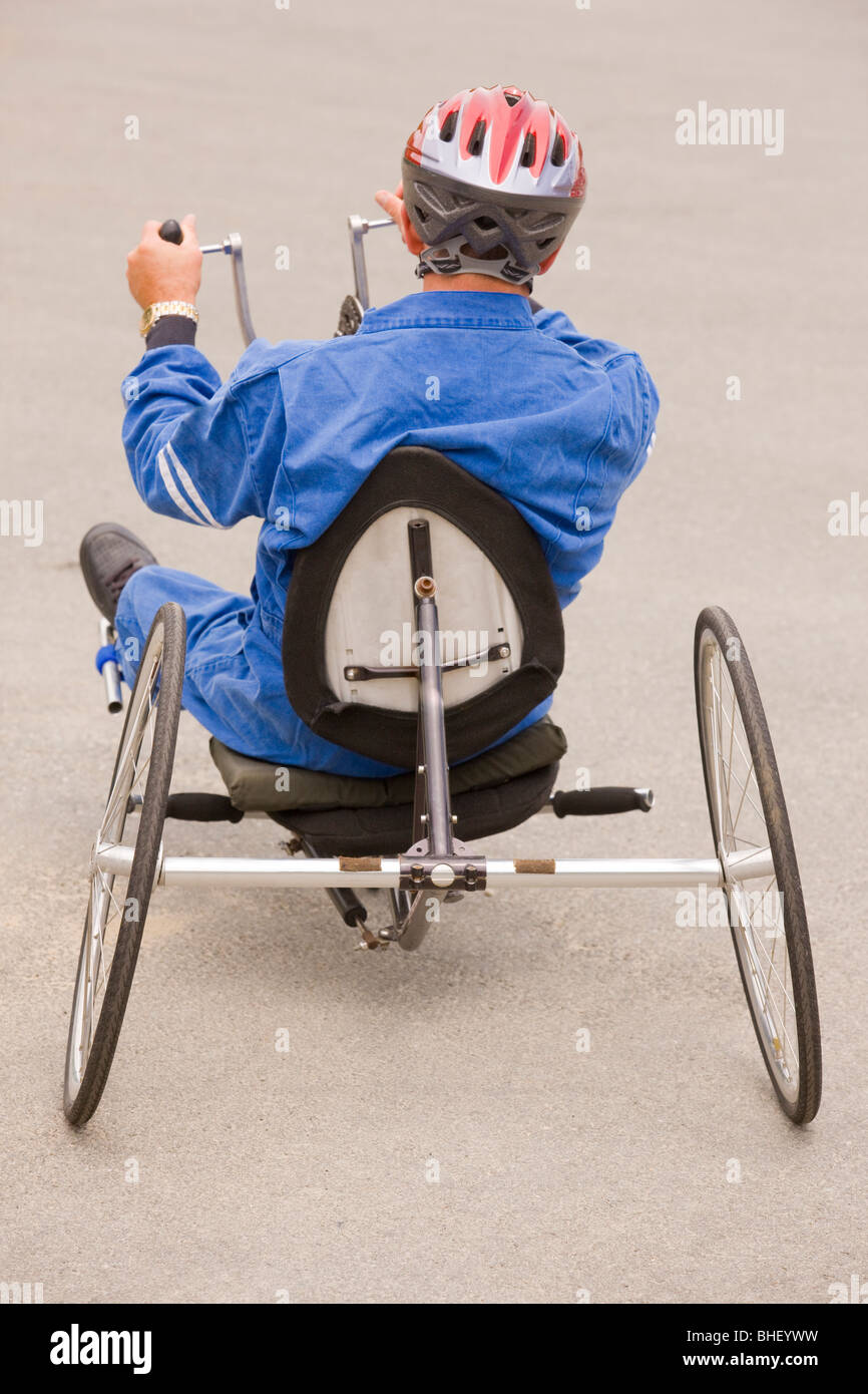Disabled man riding a racing bike Stock Photo - Alamy