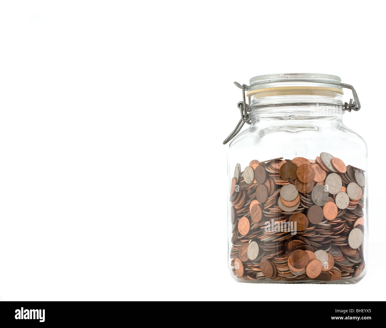 coins in a jar Stock Photo - Alamy